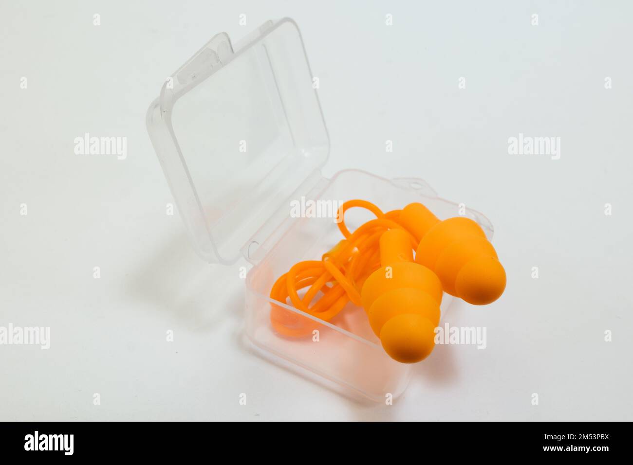 Silicone ear plugs for human ears on white background Stock Photo - Alamy