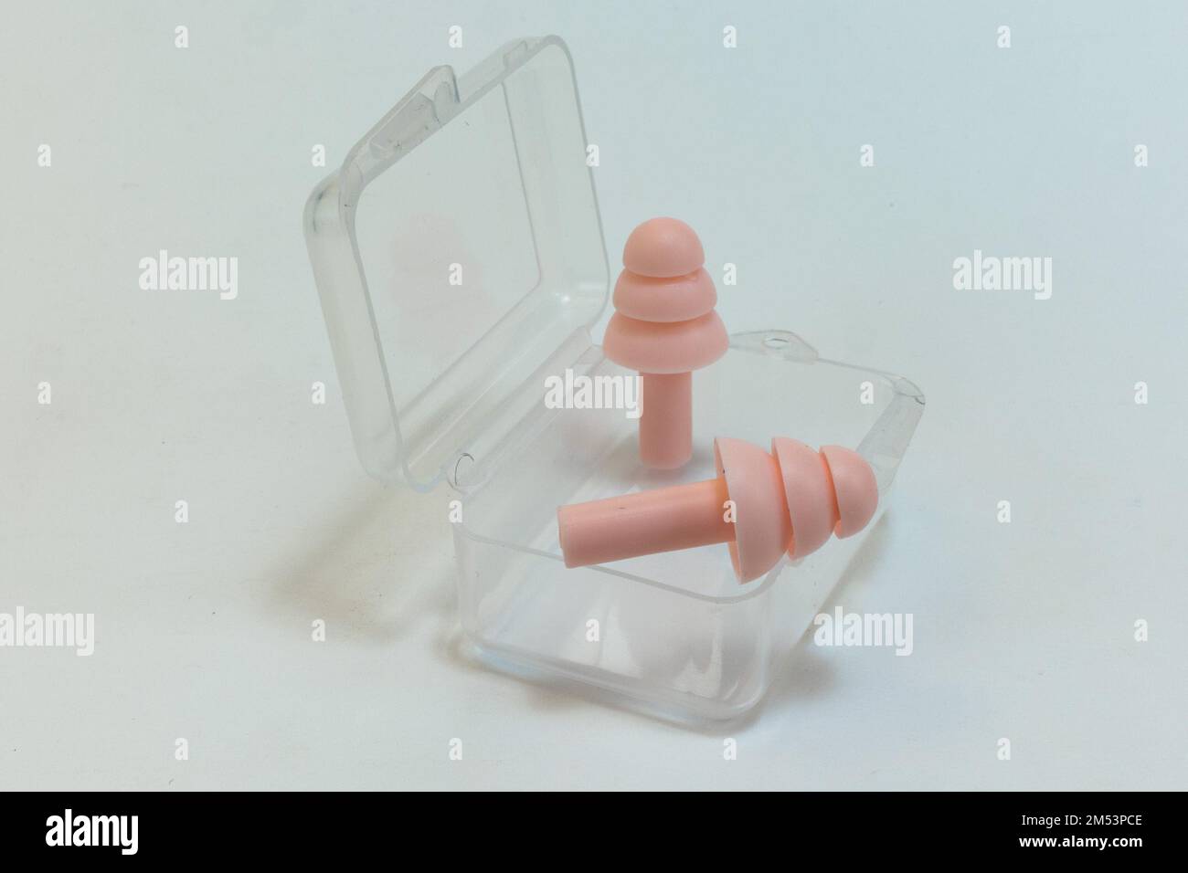 Silicone ear plugs for human ears on white background Stock Photo - Alamy