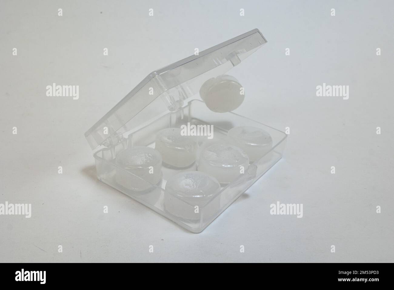 Silicone ear plugs for human ears on white background Stock Photo - Alamy
