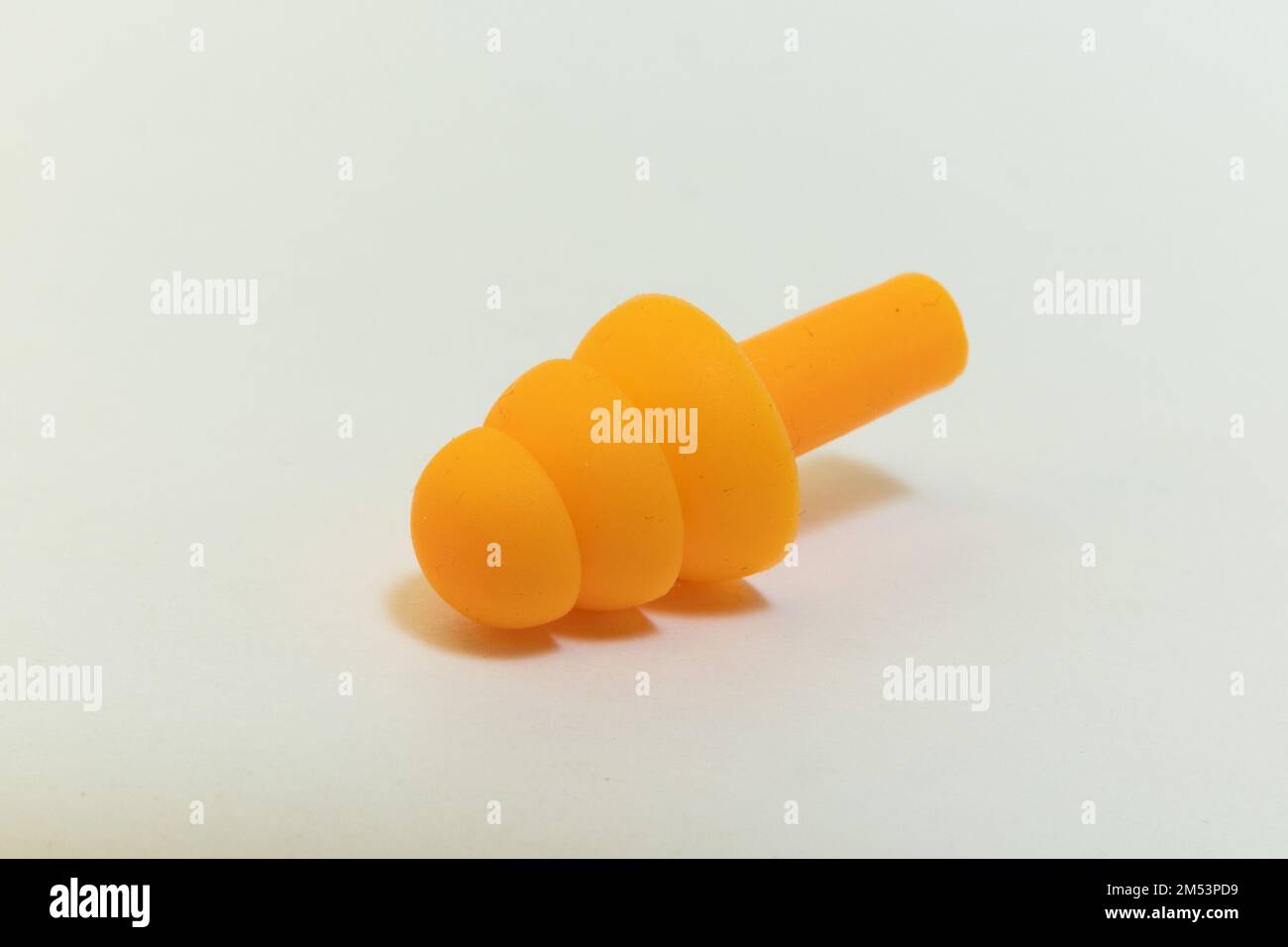 Silicone ear plugs for human ears on white background Stock Photo - Alamy