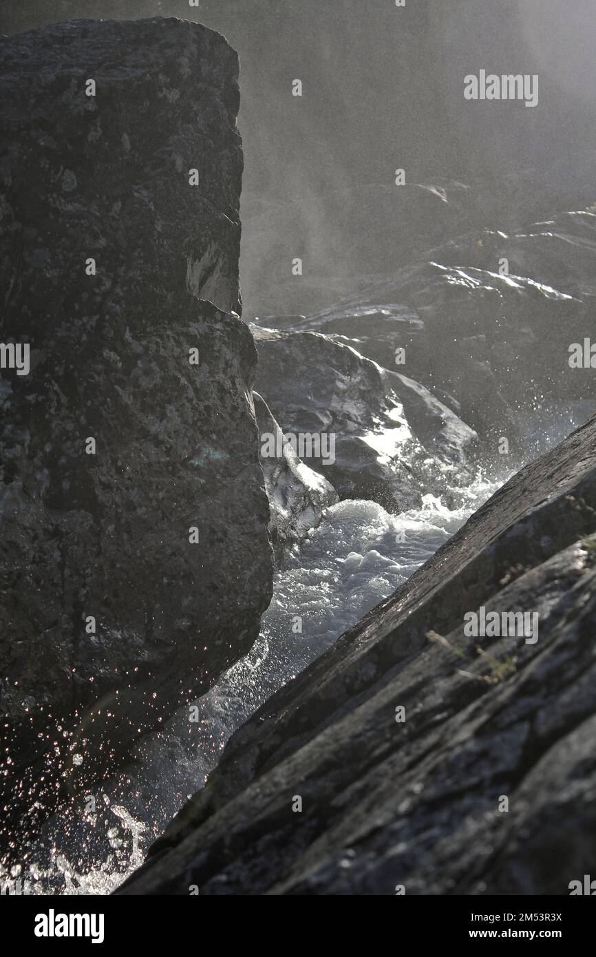Fast flowing river water of the waterfall Rjukandefossen in Hemsedal ...