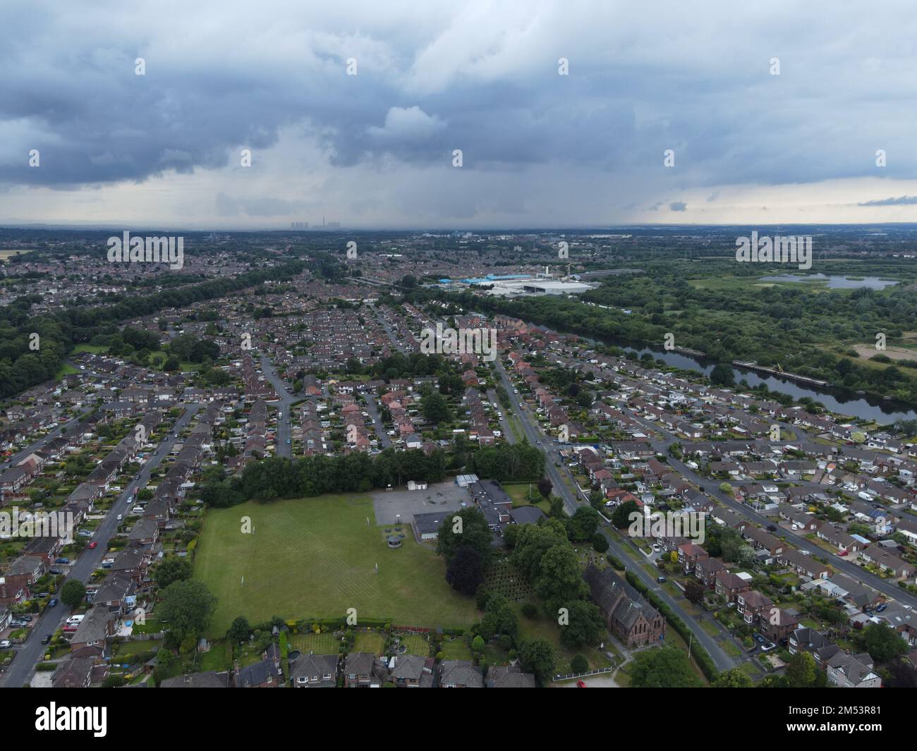 A bird's-eye view of a suburban area under a cloudy sky Stock Photo - Alamy