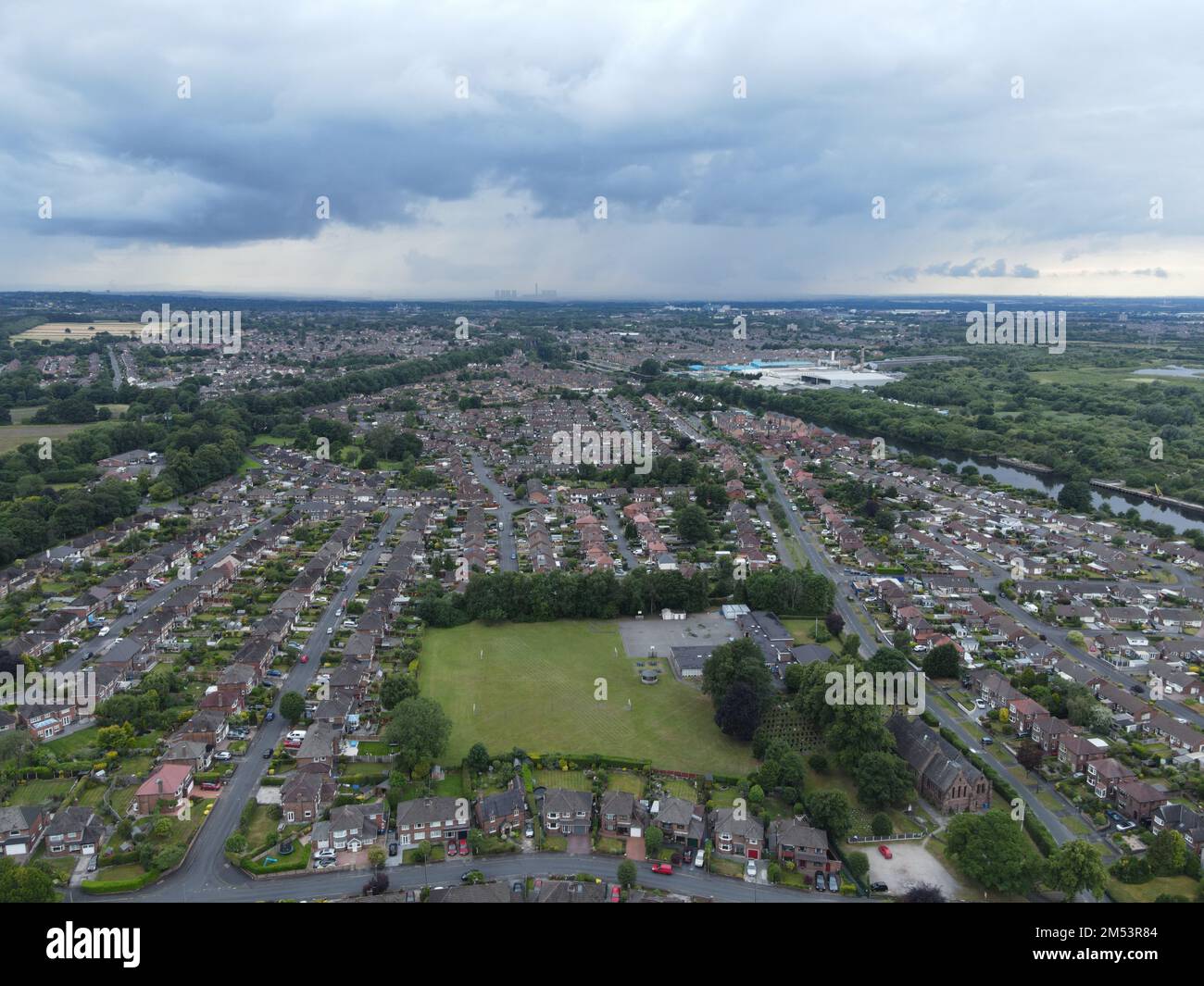 A bird's-eye view of a suburban area under a cloudy sky Stock Photo - Alamy