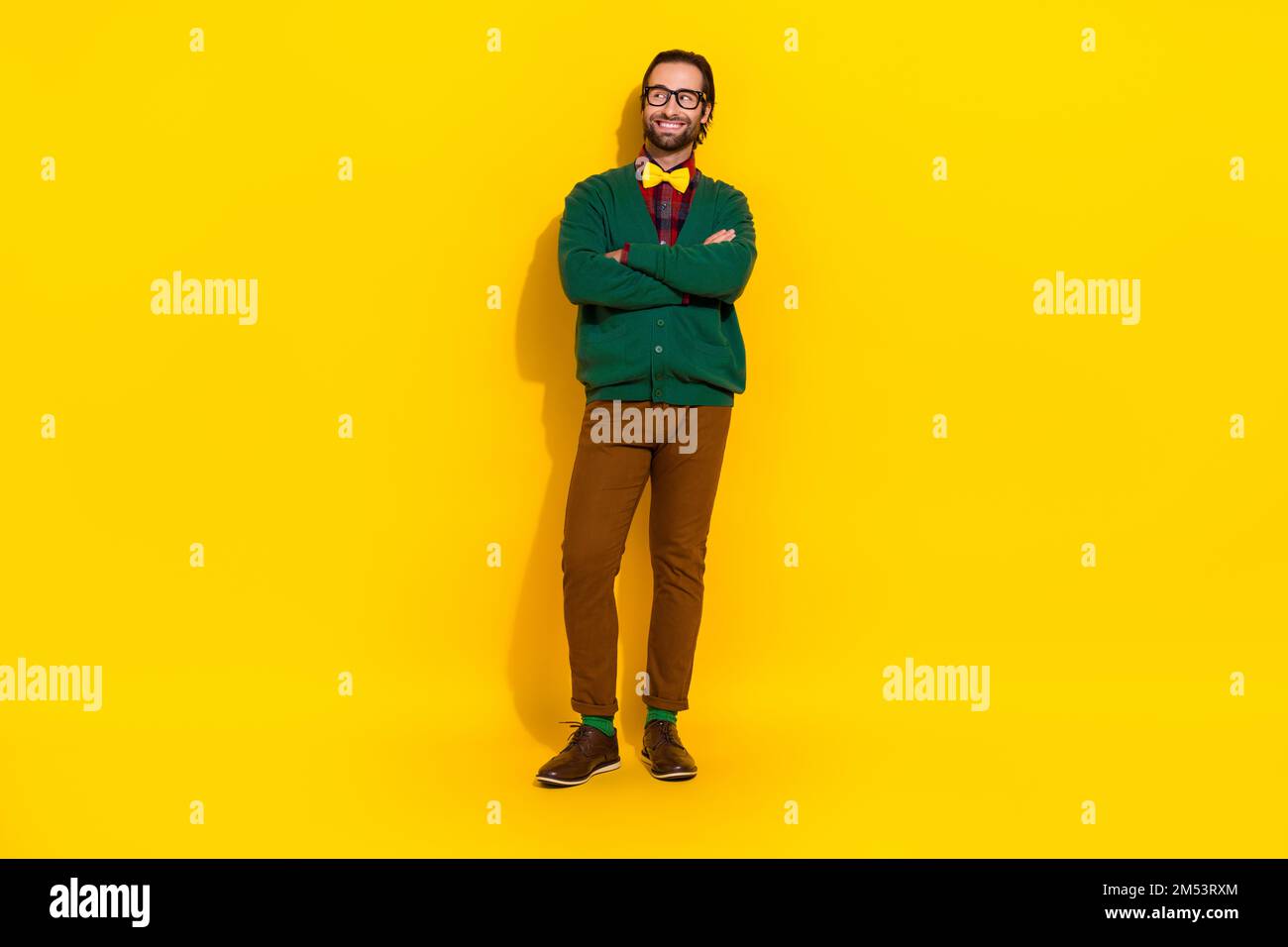 Full body photo of positive successful guy folded arms look empty space ...