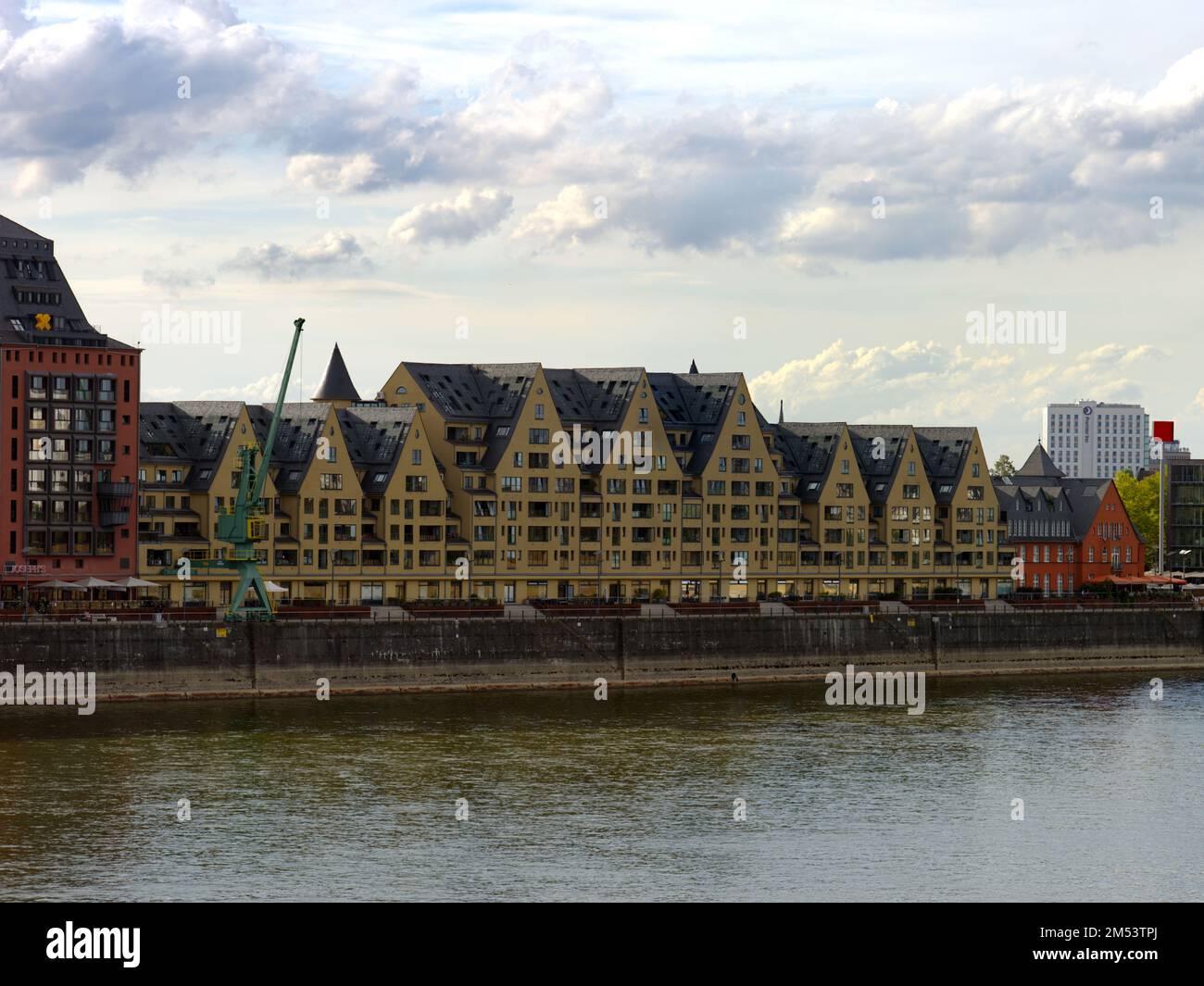 The typical, residential buildings along the river in Cologne, Germany ...