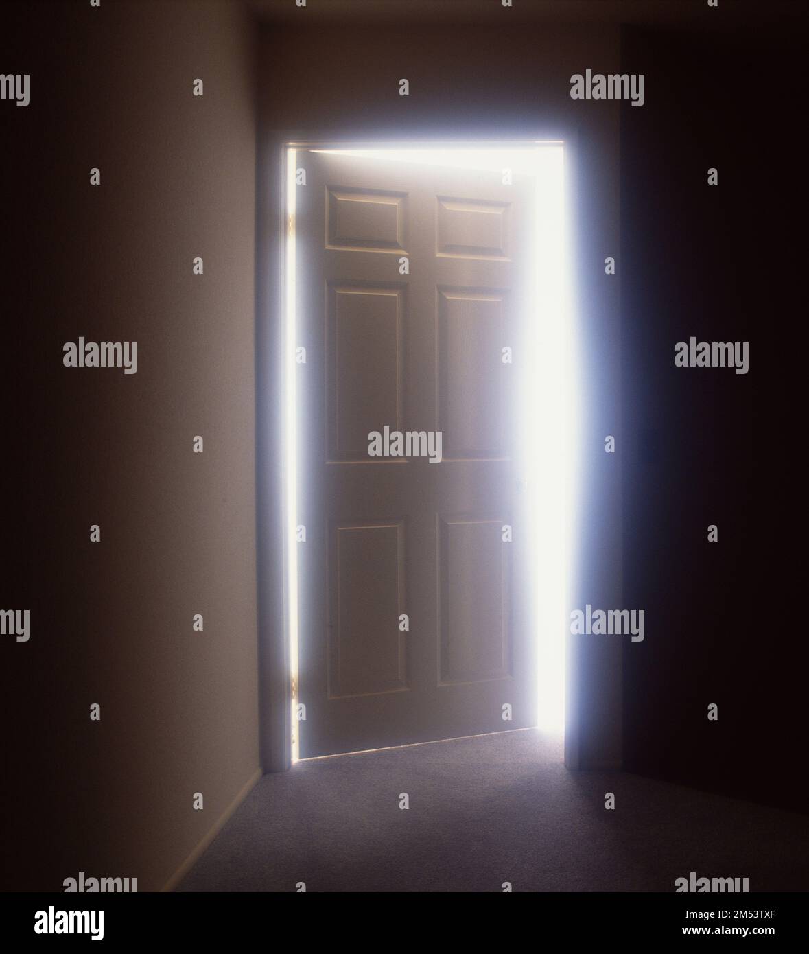 Symbolic shot of light coming through slightly opened door Stock Photo ...