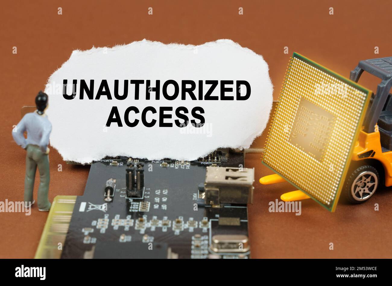 Computer concept. On the board with microcircuits lies a paper plate ...