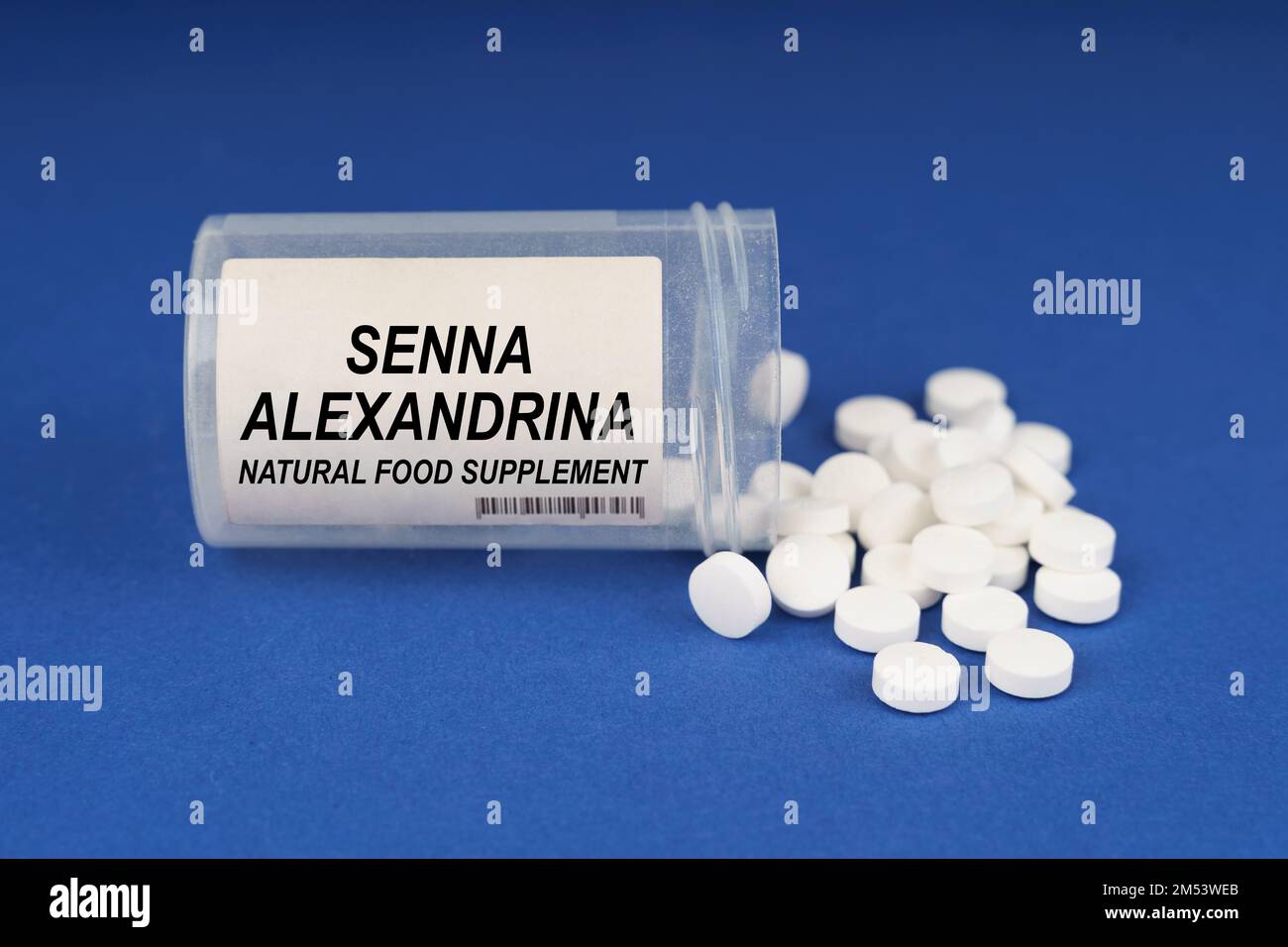 The concept of pharmacology and health. On a blue surface are pills and ...
