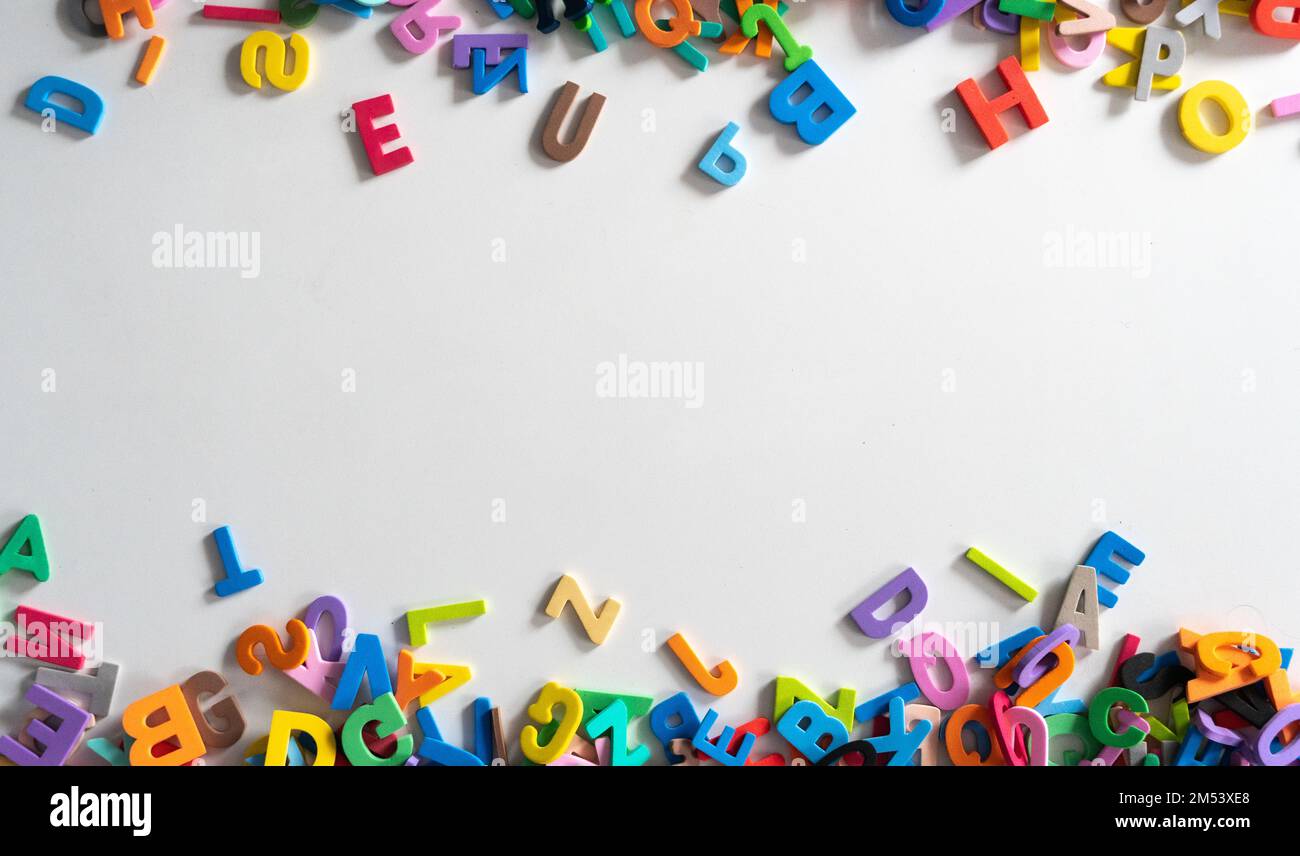 White background with colored lettering at the top and bottom and blank ...