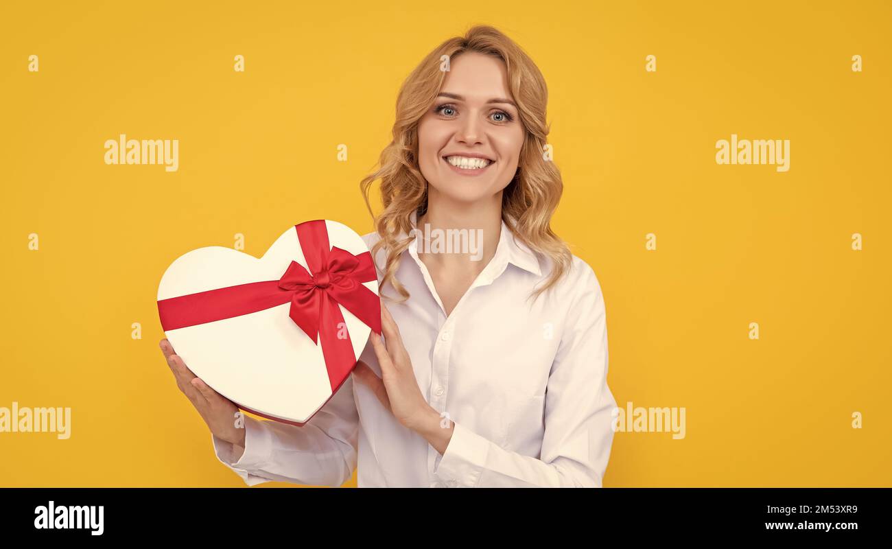 Happy woman present heart hi-res stock photography and images - Alamy