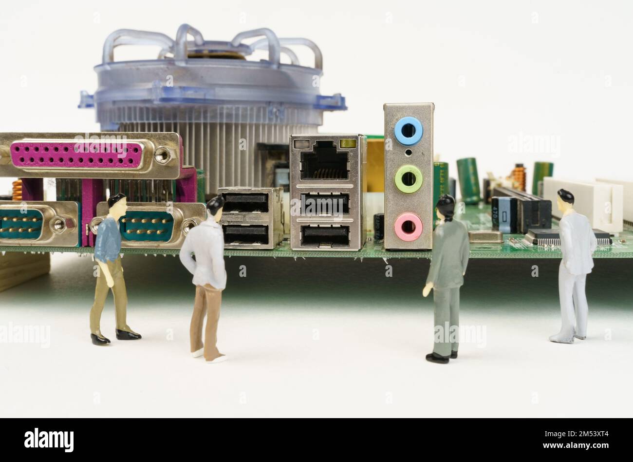 Computer technology concept. Near the motherboard of the computer are ...