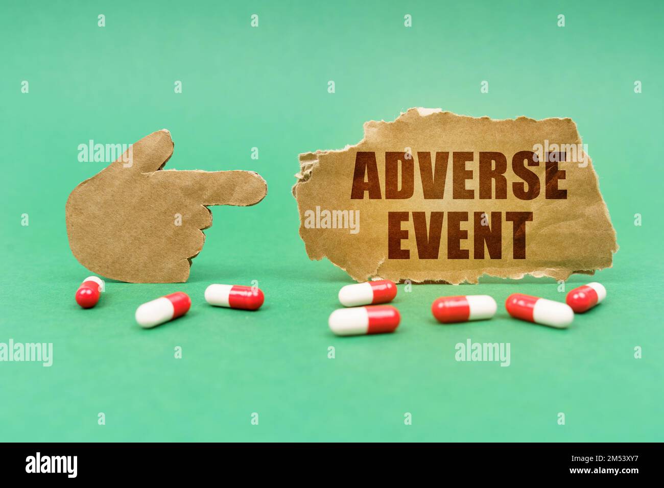 Medical concept. On the green surface of the tablet and a hand pointing ...