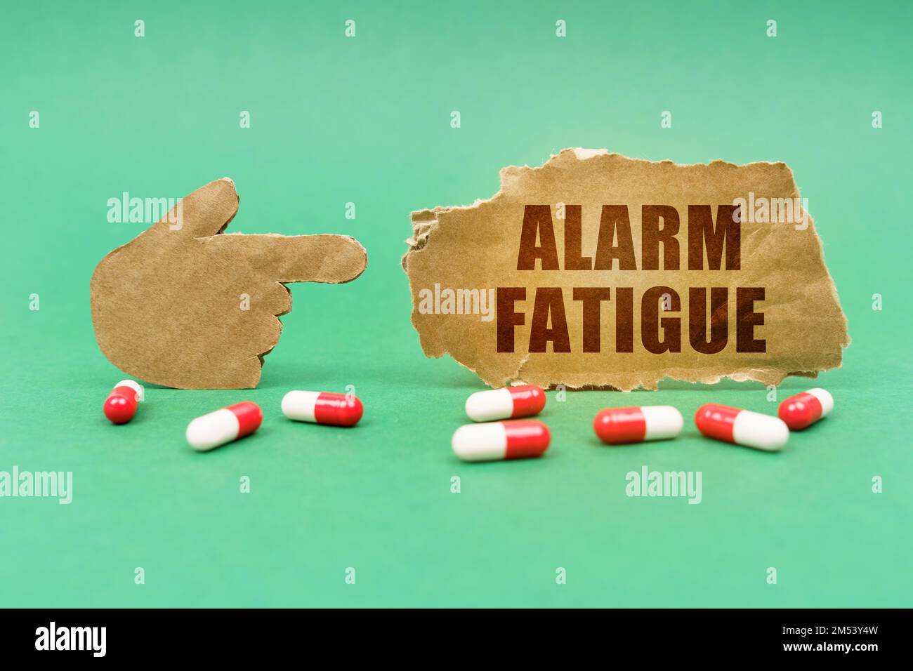 Medical concept. On the green surface of the tablet and a hand pointing ...