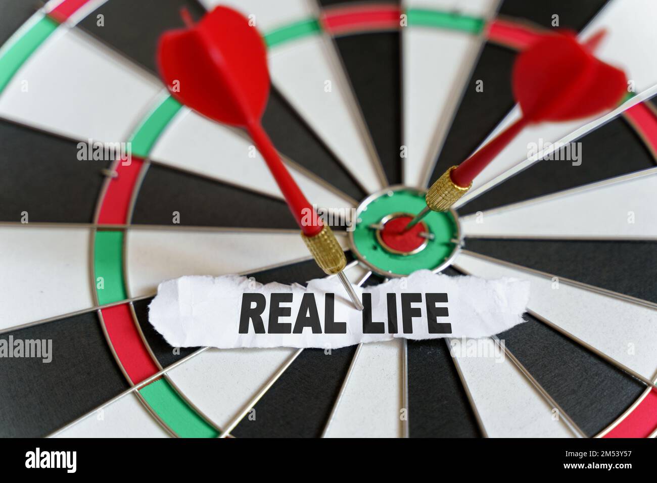 Medical concept. The picture shows a target, darts and a torn piece of ...