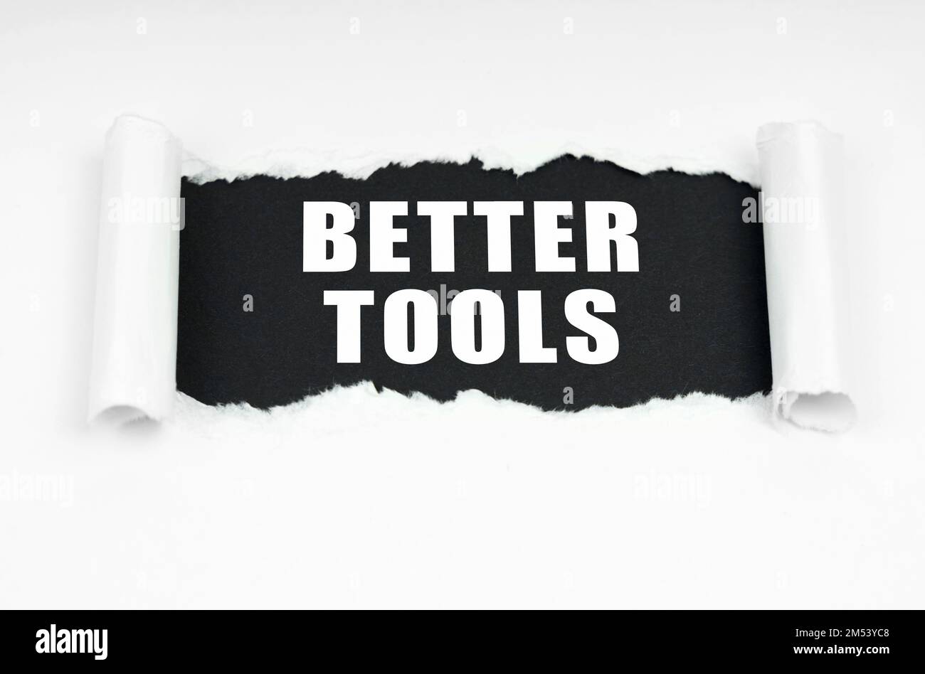 Business concept. In the middle of the white sheet is a black frame ...