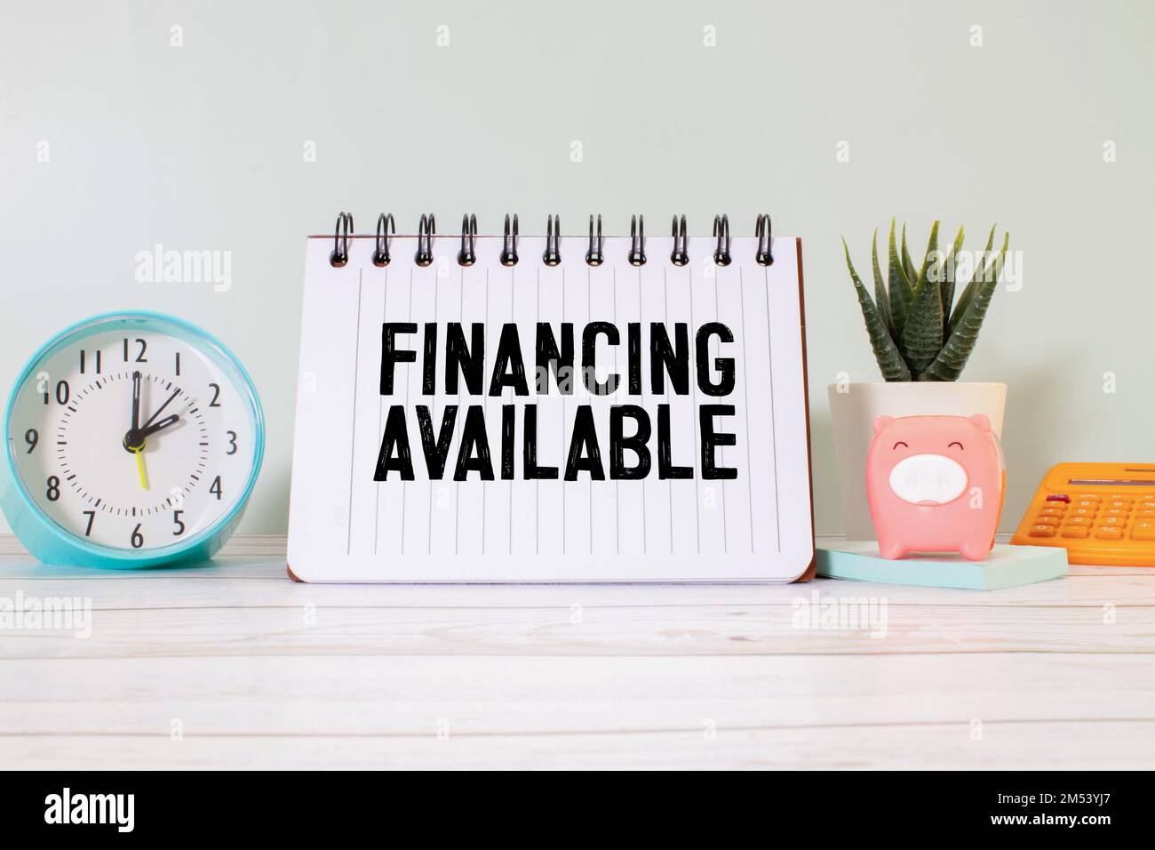 White card on the black background with text Financing Available ...