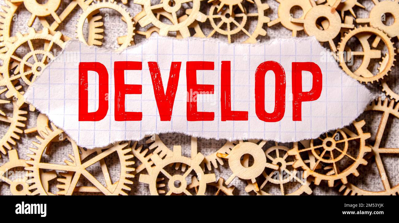 Develop word written on wood block. Develop text on cement table for ...