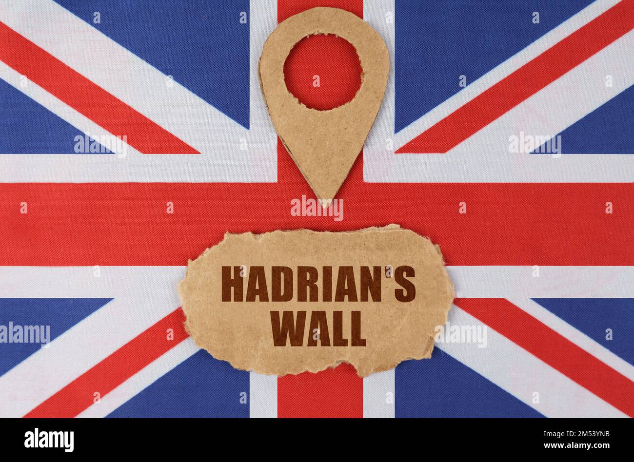 Travel concept. On the flag of Great Britain lies a symbol of ...