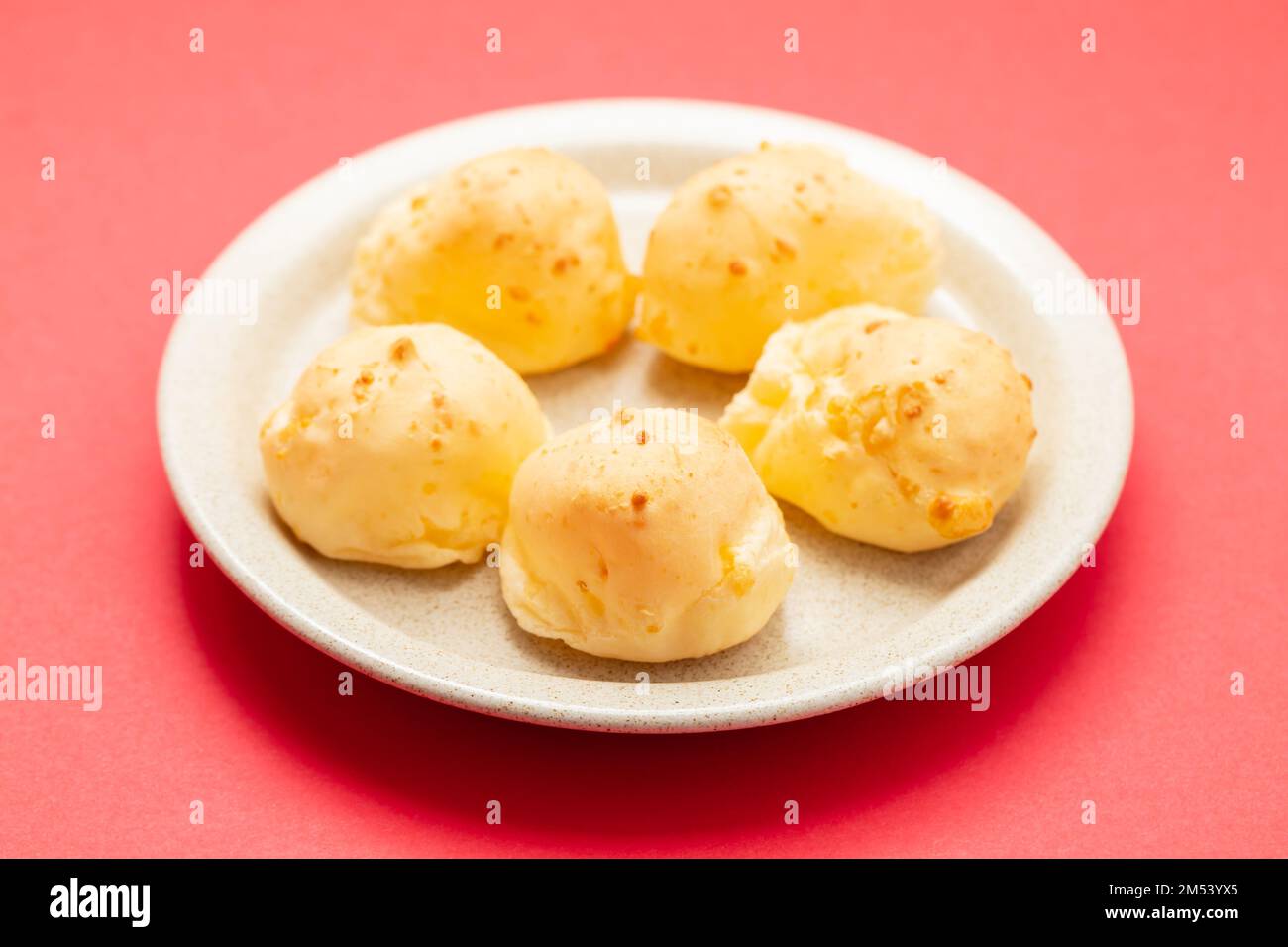 Brazilian snack pao de queijo cheese bread on white small dish Stock ...