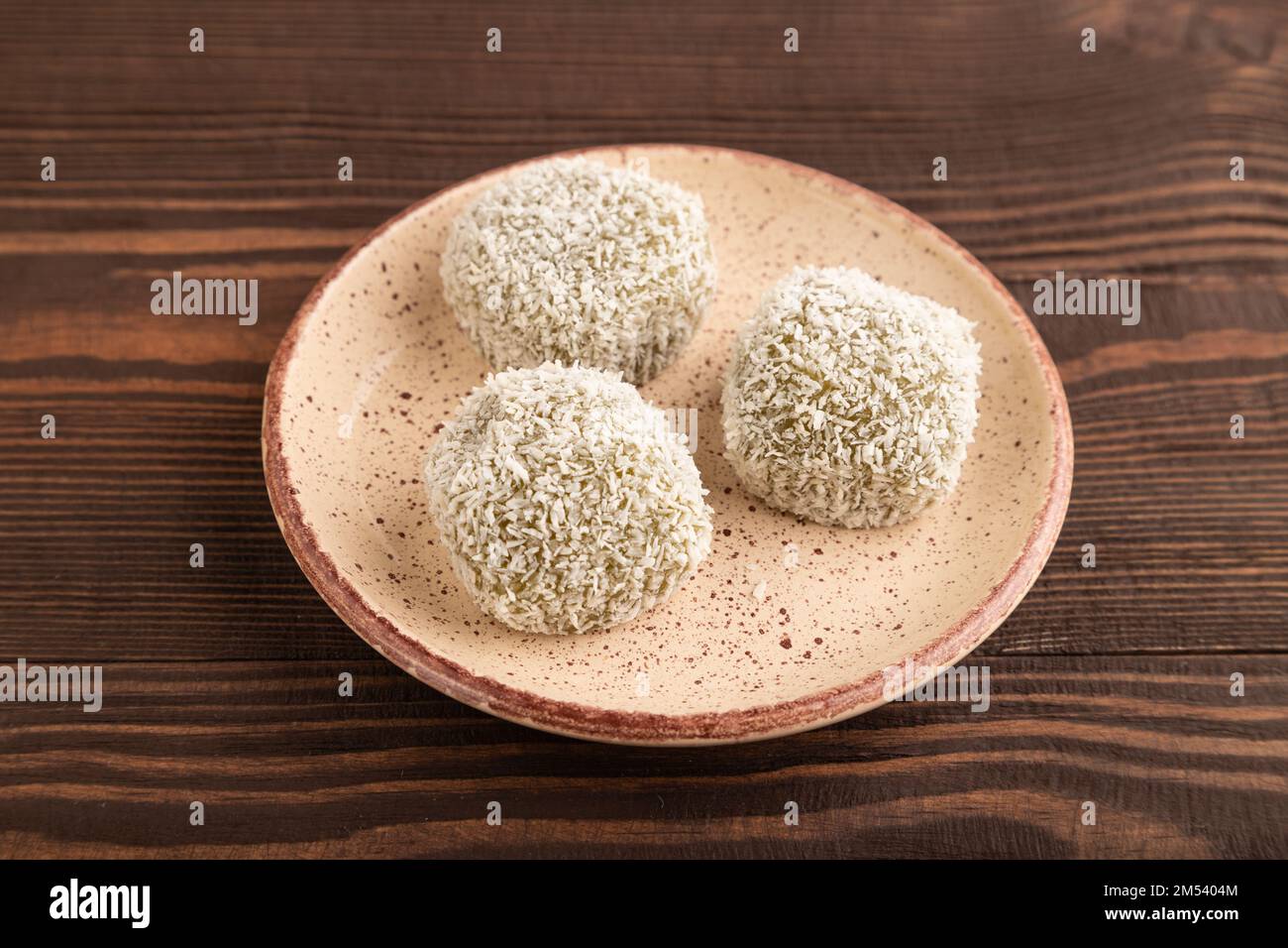 Japanese rice sweet buns mochi filled with pandan and coconut jam on ...