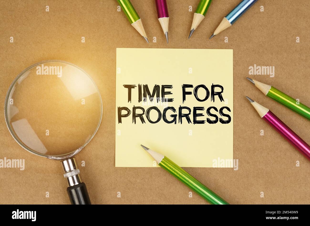 Education concept. On the table are pencils, a magnifying glass and a ...