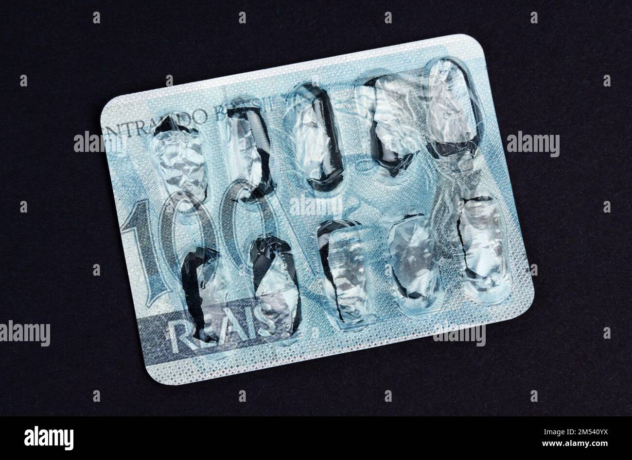 Medicine and business concept. On the blister with pills there is an ...