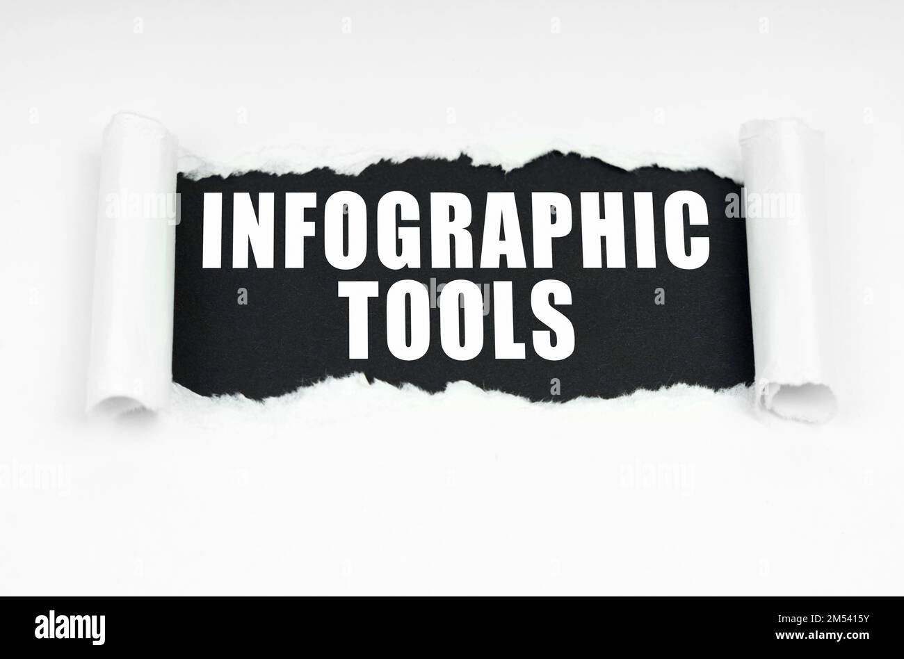 Business concept. In the middle of the white sheet is a black frame ...
