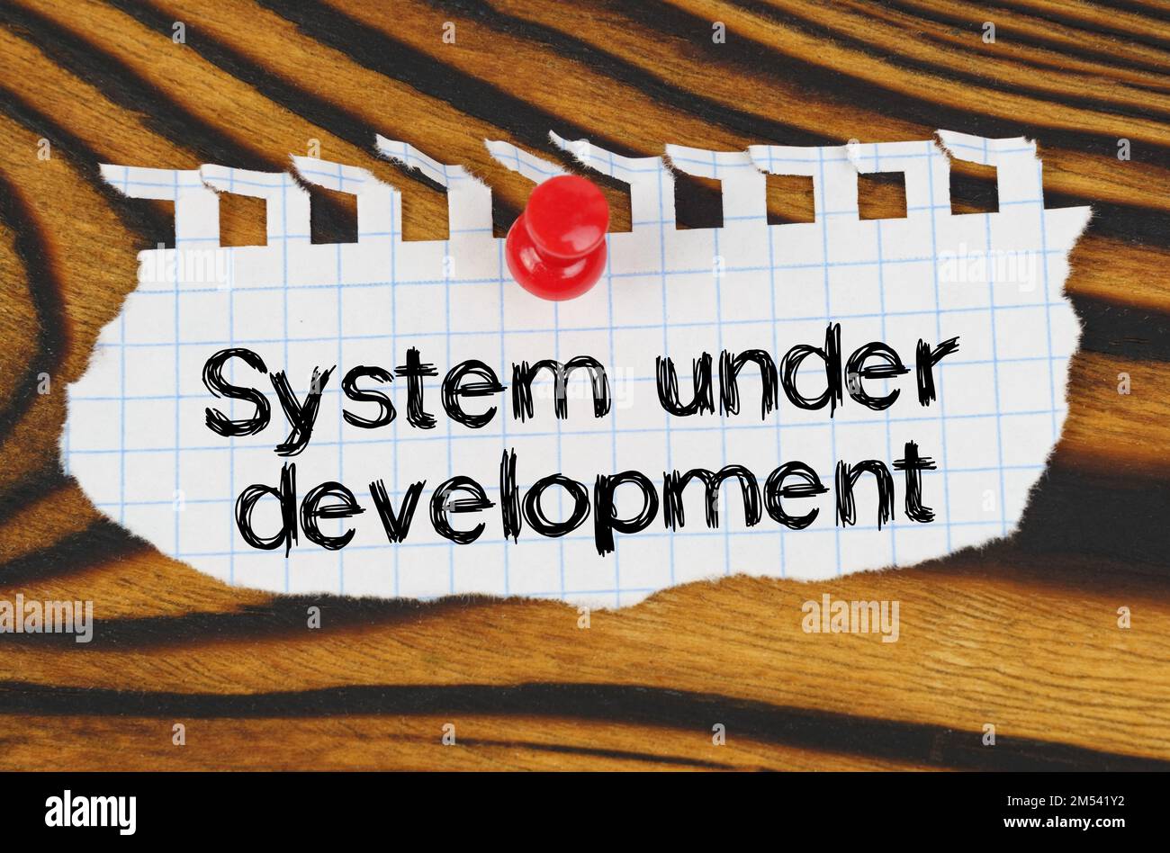 Business concept. Attached to the board is an announcement with the ...