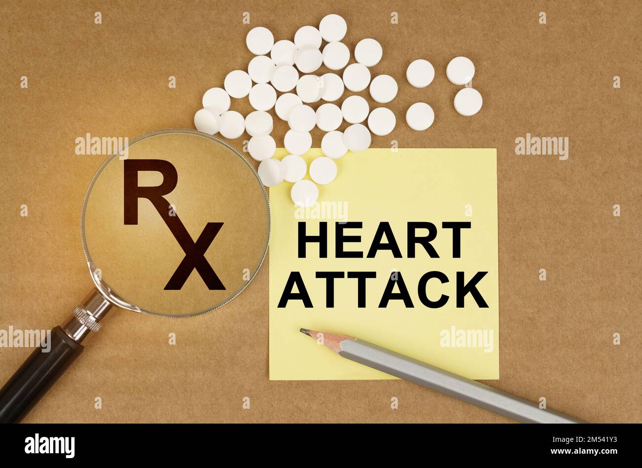 Medical concept. On the table are pills, a magnifying glass, pencils ...