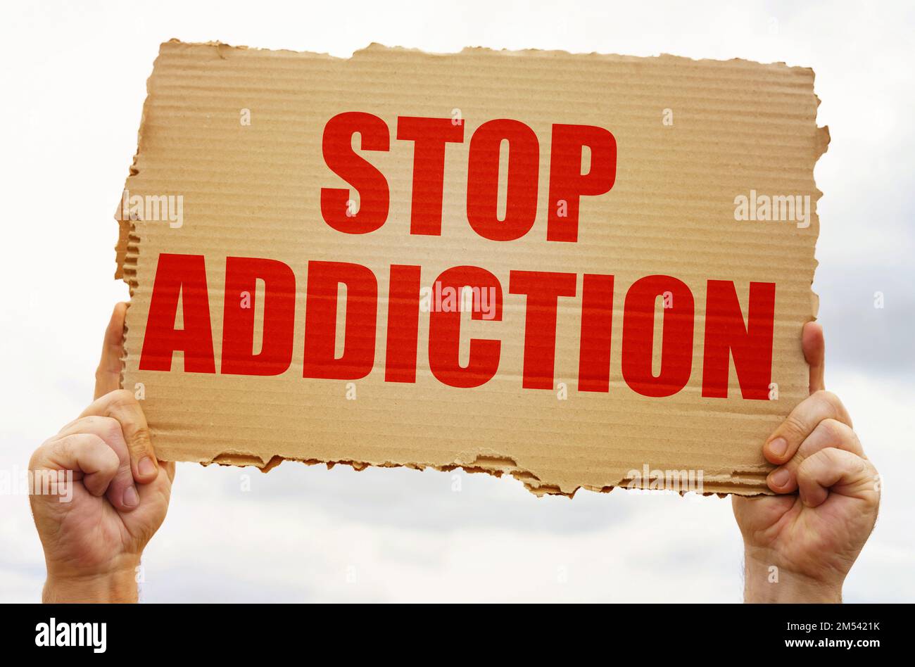 Medical concept. In the hands of a man is a cardboard sign with the ...