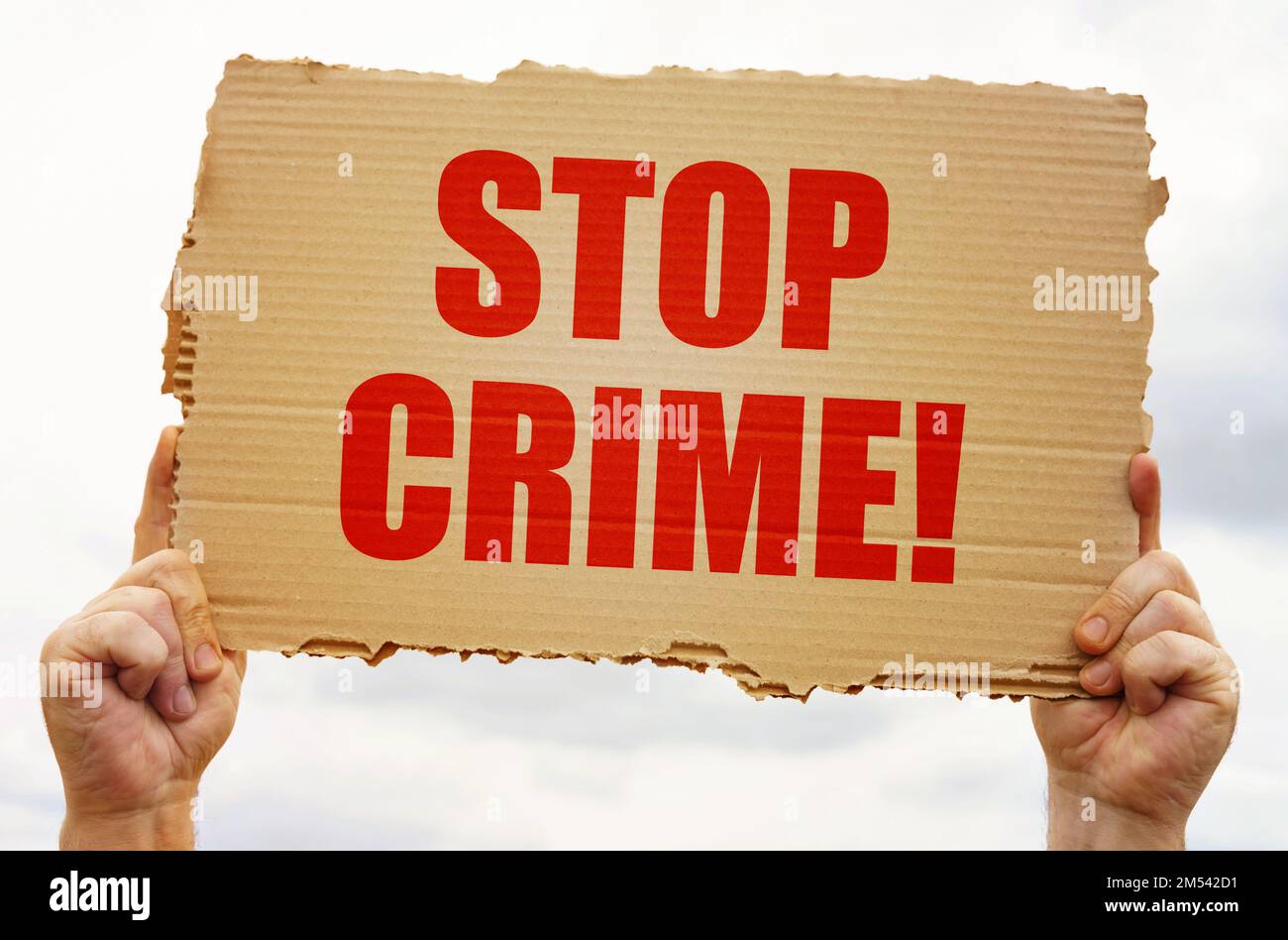 People concept. In the hands of a man is a cardboard sign with the ...