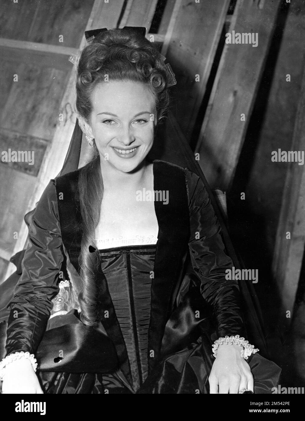 JOAN GREENWOOD candid portrait on set during filming of SARABAND FOR ...