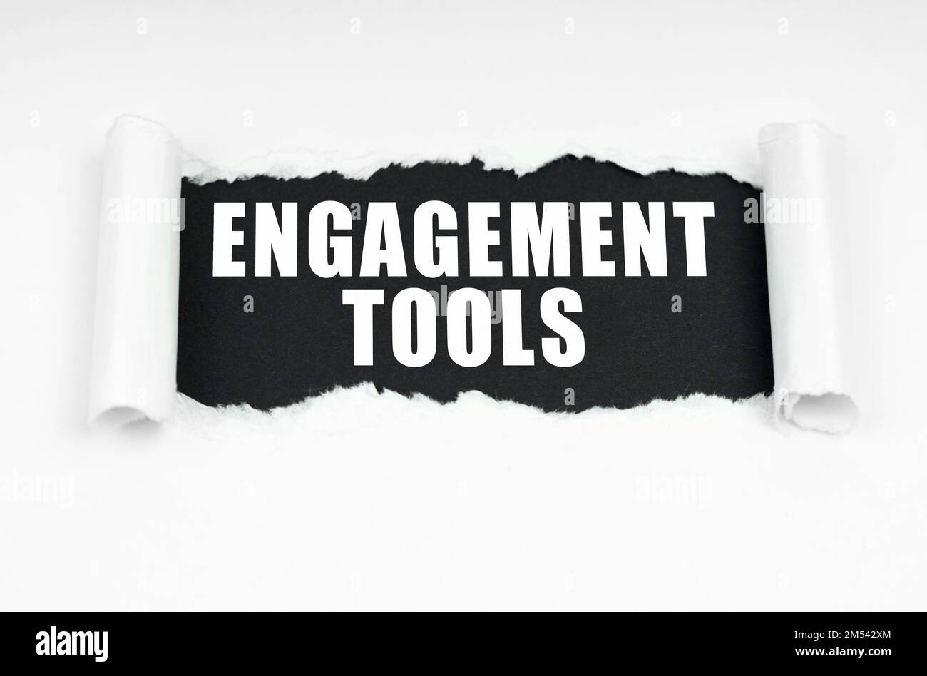 Business concept. In the middle of the white sheet is a black frame ...