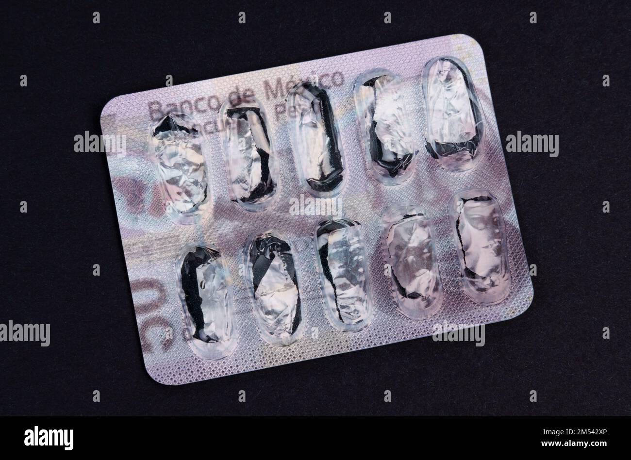Medicine and business concept. On the blister with pills, an image of ...