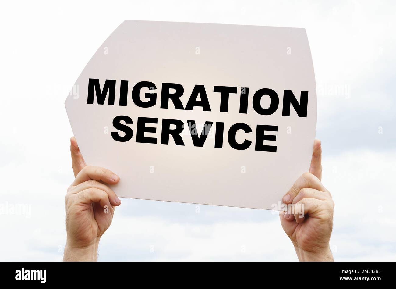 Technological concept. Against the background of the sky in the hands ...