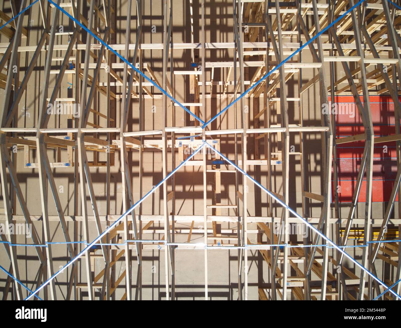 Building construction framework aerial view showing pine timber truss ...