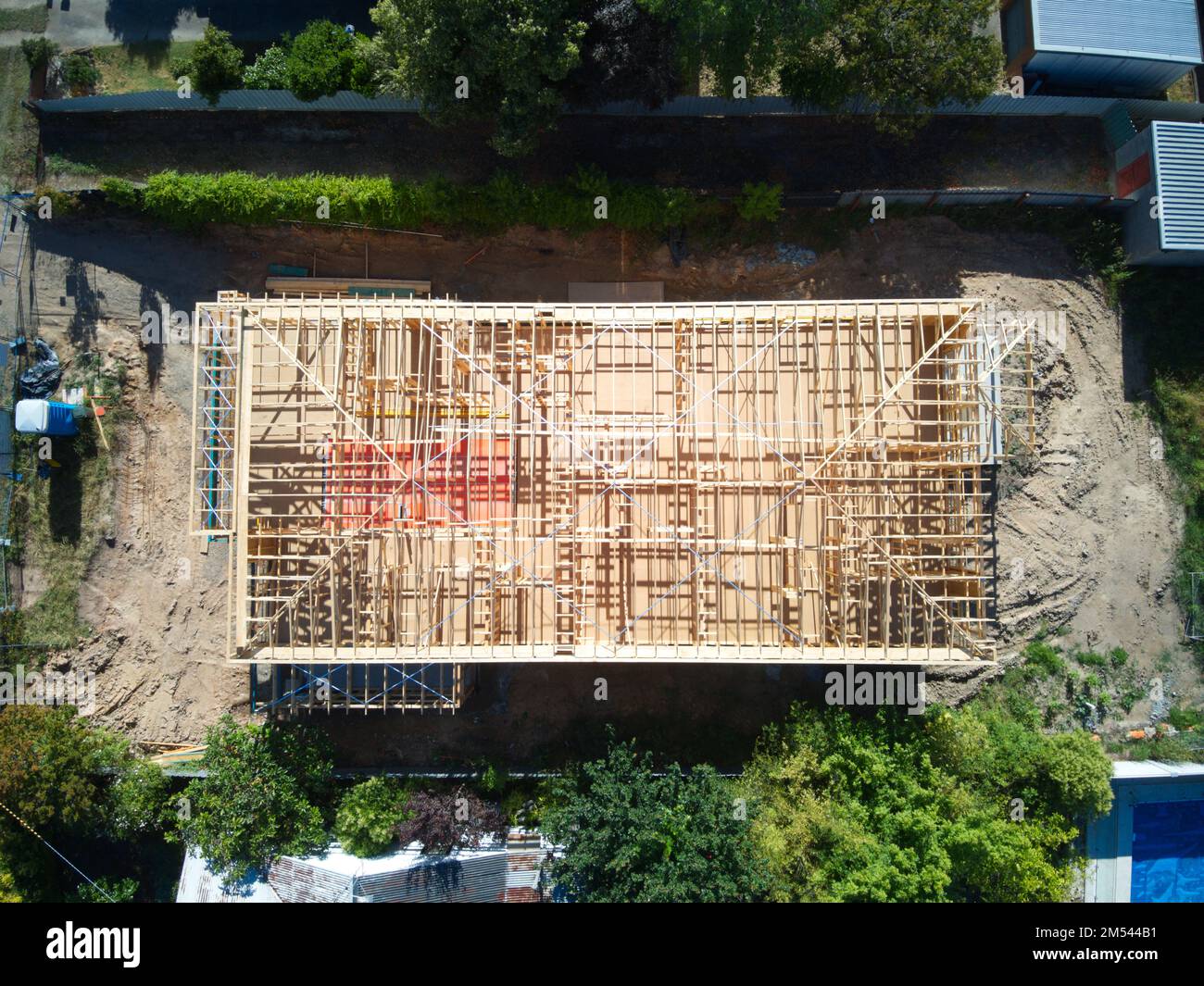 Residential house construction aerial view showing pine timber truss ...