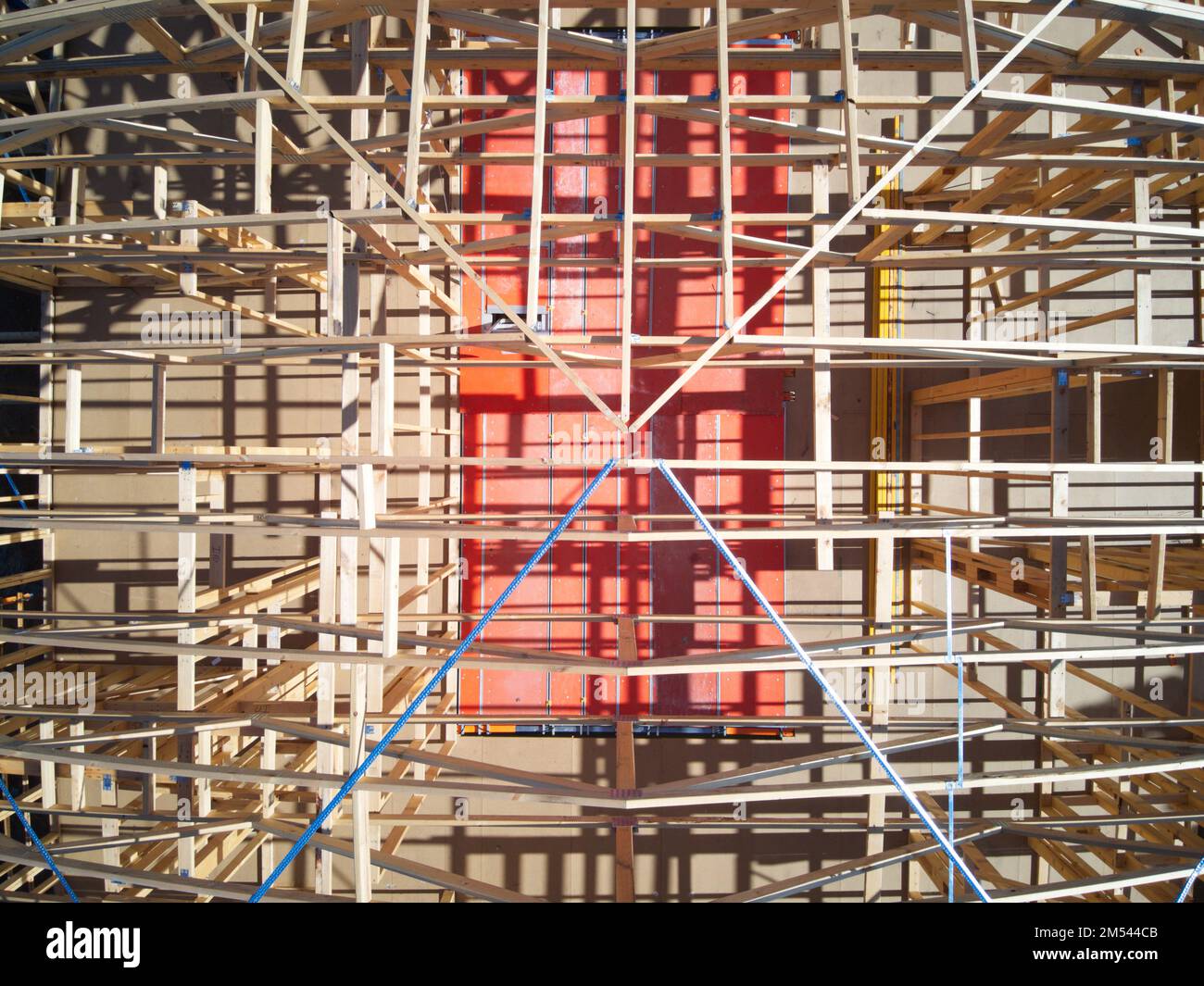 Building construction framework aerial view showing pine timber truss ...