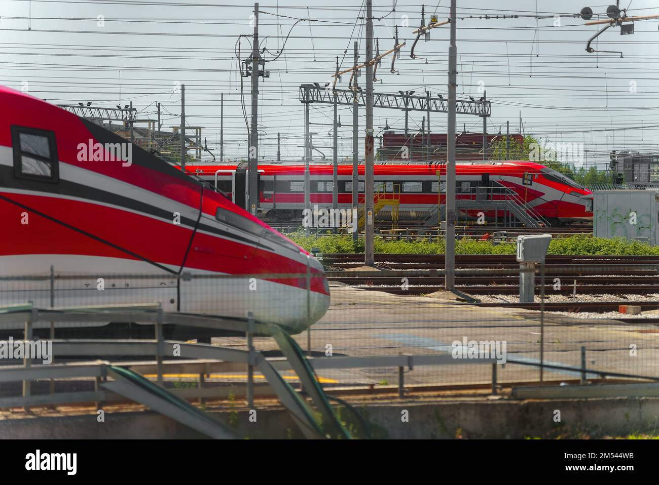 High speed trains in the city Stock Photo - Alamy
