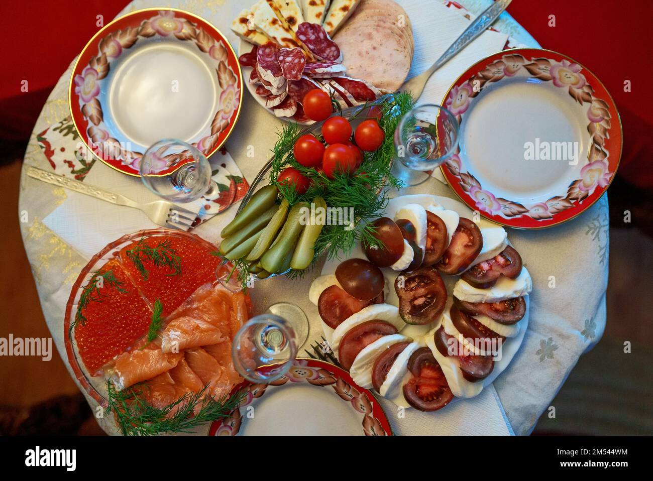 Russian New Year's table. Red fish, caviar and pickles for vodka Stock ...