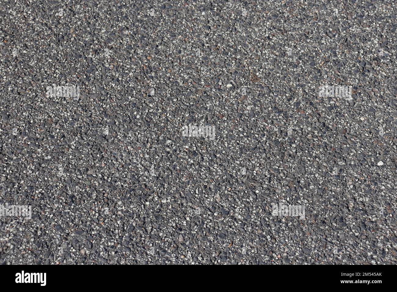 A close up of bitumen road surface Stock Photo - Alamy
