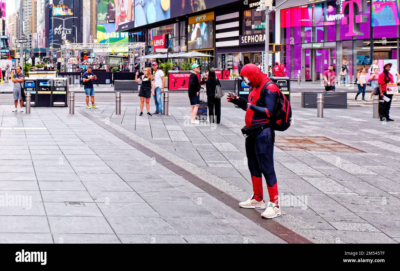 Spiderman in Times Square using Cell Phone Stock Photo - Alamy