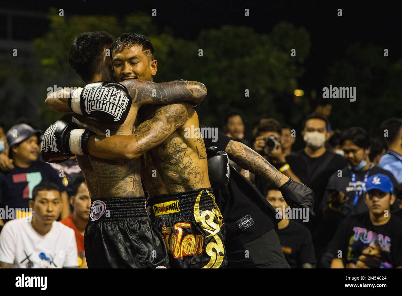 Fighters seen hugging each other after the fight at Bangmot Sport ...