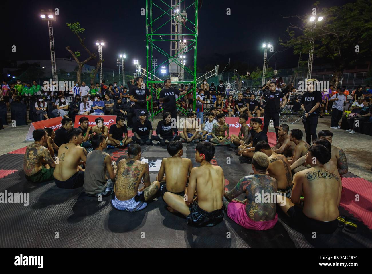 Fight Club Thailand staff members seen talking to the fighters at ...