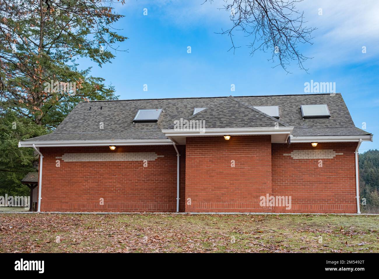 Large Red Brick Traditional Home House. Brick Facade of the fragment of ...