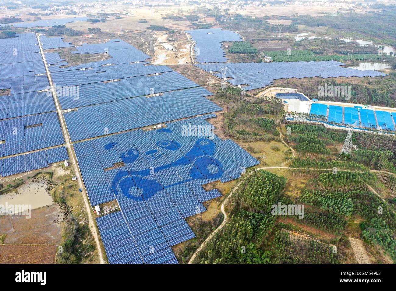 Aerial photo shows a photovoltaic power station with the giant panda ...