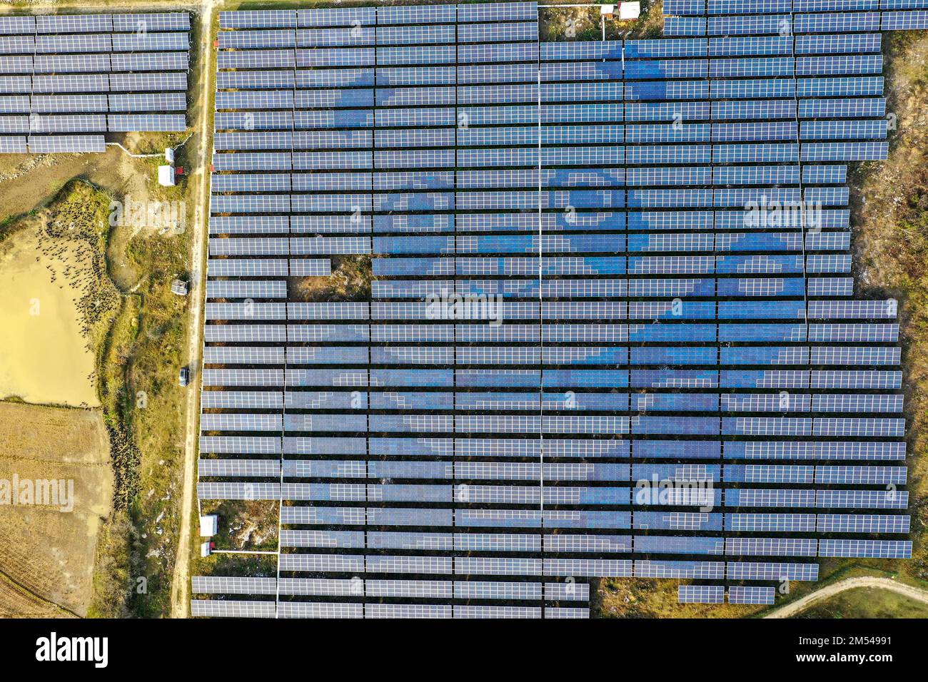 Aerial photo shows a photovoltaic power station with the giant panda ...