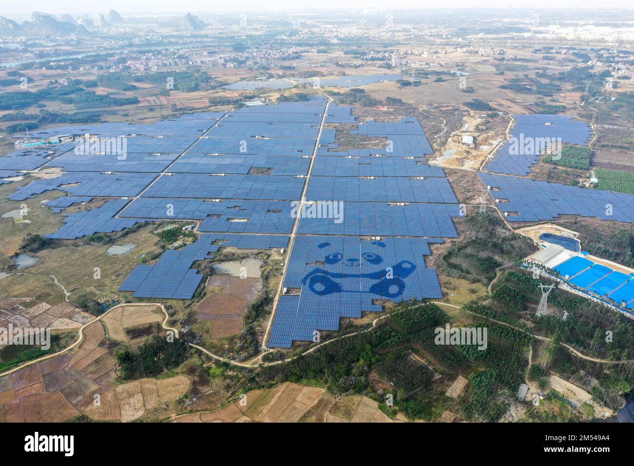 Aerial photo shows a photovoltaic power station with the giant panda ...