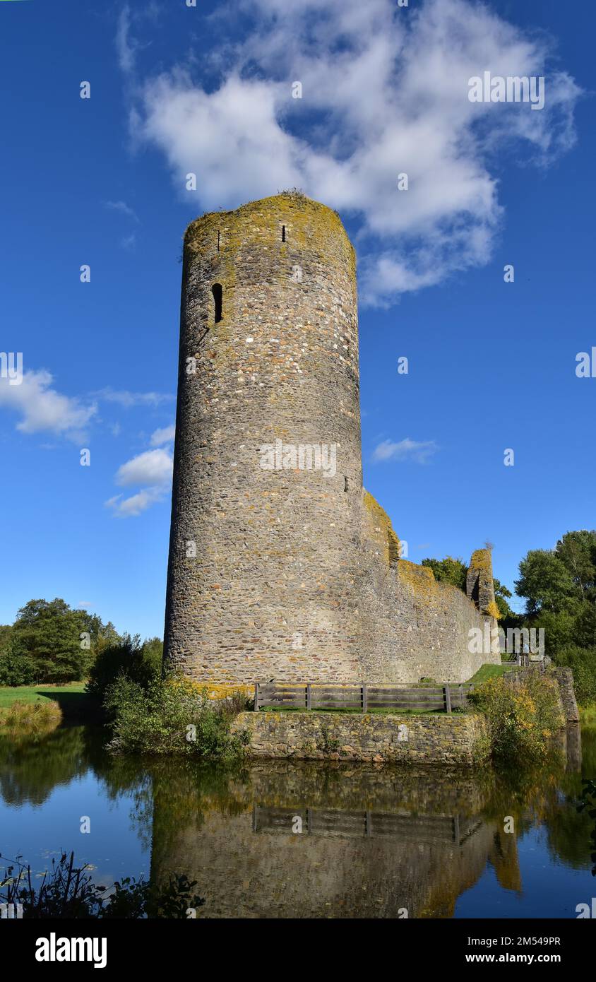 The ruins of the moated castle of Baldenau in the valley of the Dhron ...