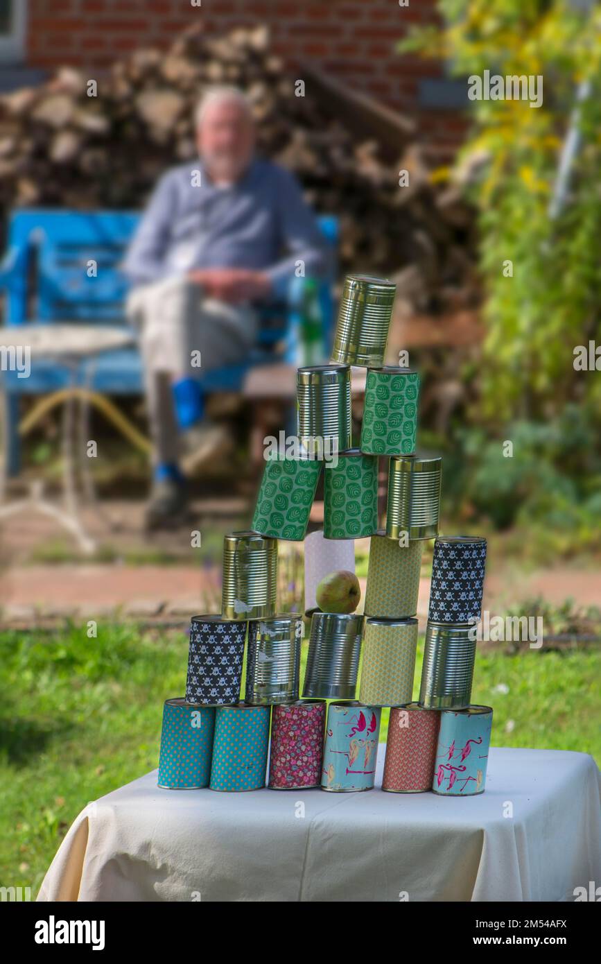 Throwing ball at cans hi-res stock photography and images - Alamy